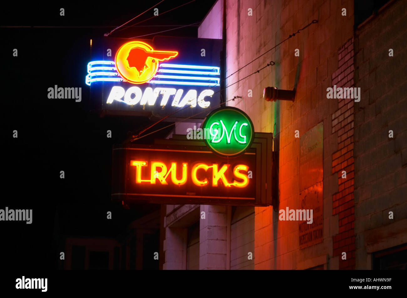 Pontiac and GMC Trucks vintage neon signs at night in the Finger Lakes ...