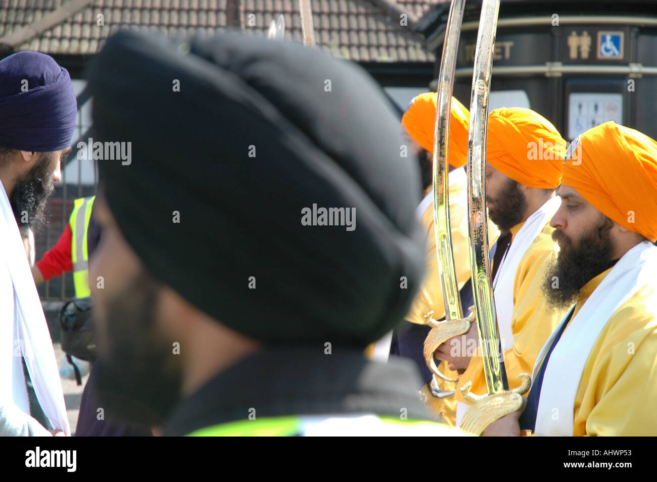 Sikh chiefs with turbans marching with golden swords on Vaisakhi Parade ...