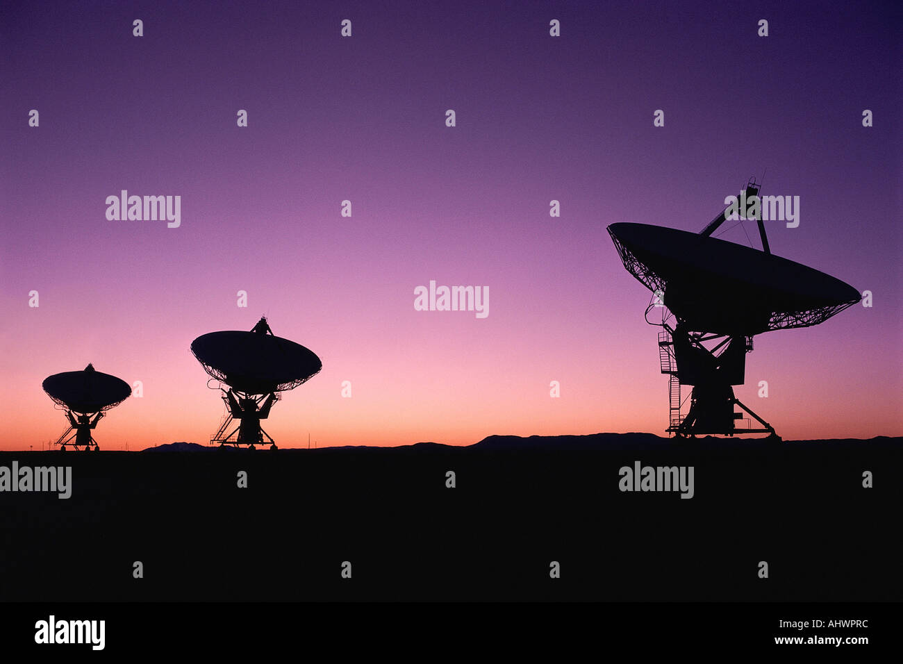 VLA Very Large Array radio telescope dish field in twilight Stock Photo ...