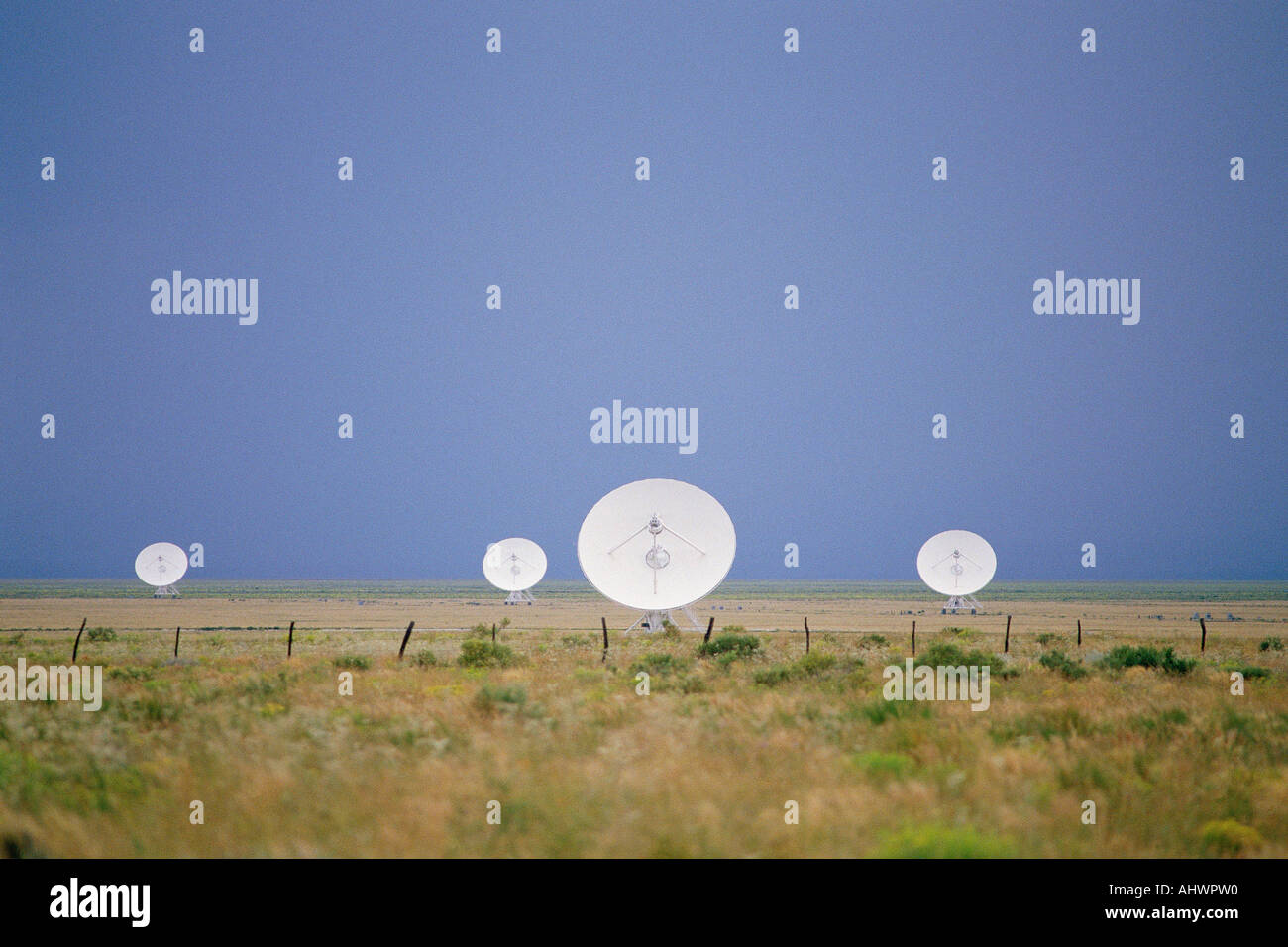 VLA Very Large Array radio telescope dishes in field Stock Photo - Alamy