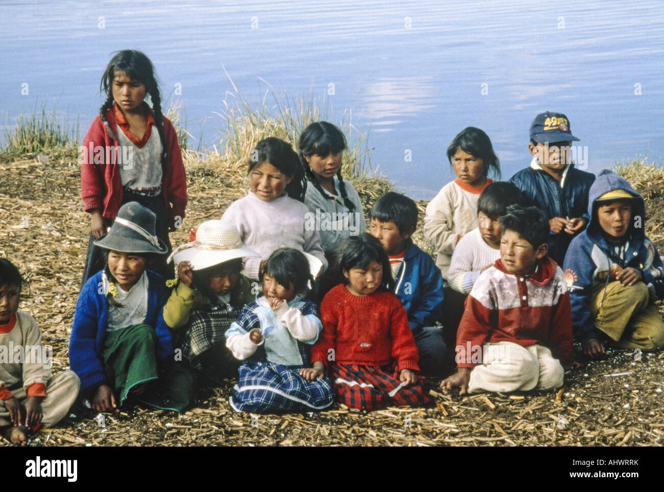 LAKE TITICACA Uros children who live on one of the floating reed ...