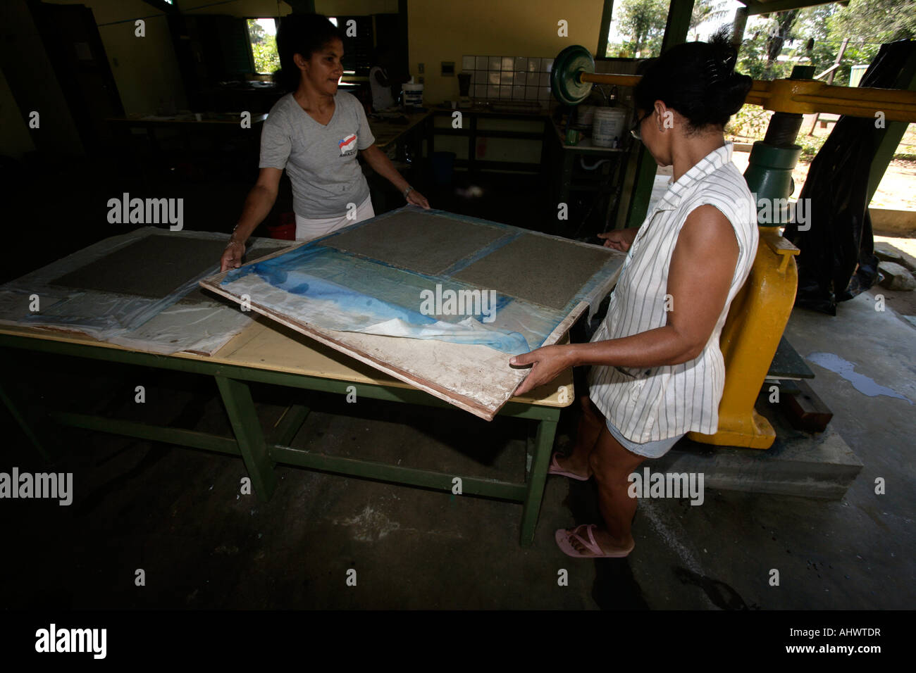 Recycling paper Small scale recyclling plant Stock Photo - Alamy