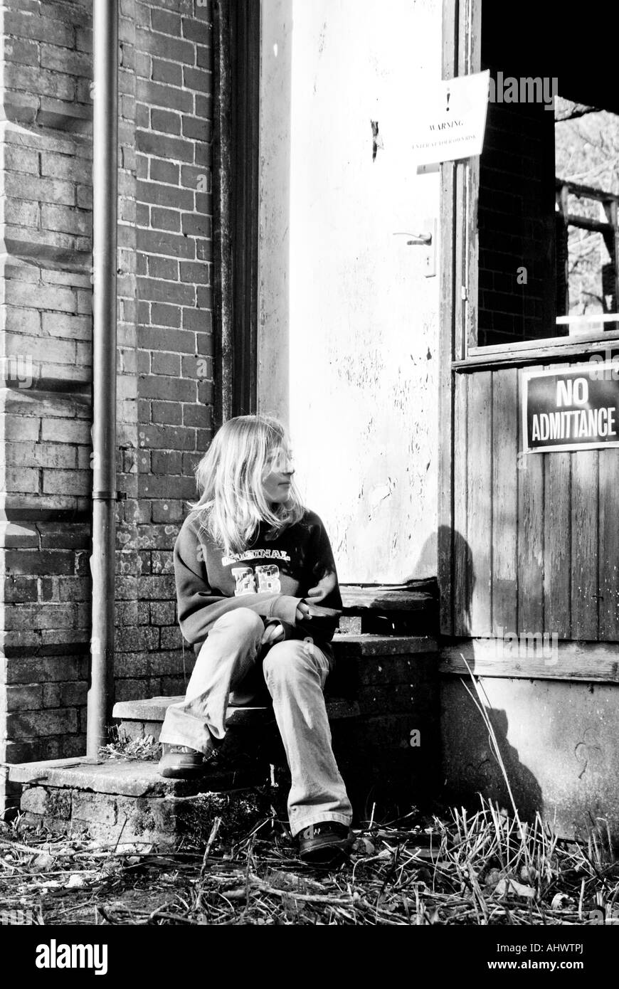 Young girl on a demolition site Stock Photo - Alamy