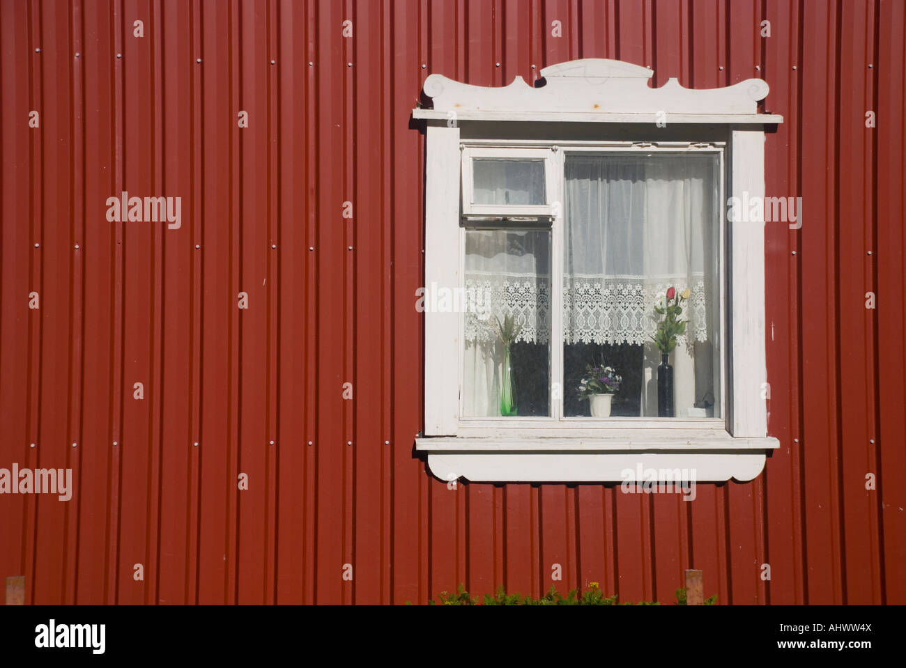 A traditional Icelandic window set against a colourful wall Stock Photo ...