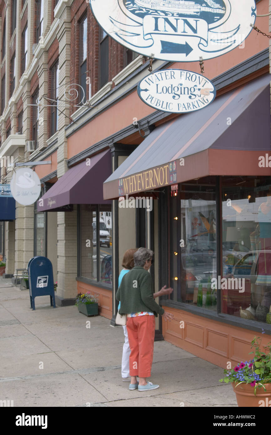 Window shopping on Main Street in historic downtown Mystic Connecticut ...