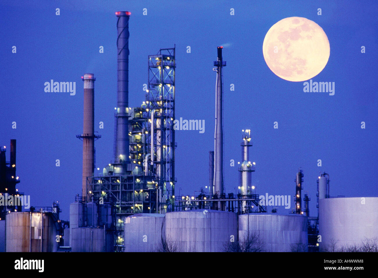 Chemical manufacturing plant with full moon Stock Photo - Alamy