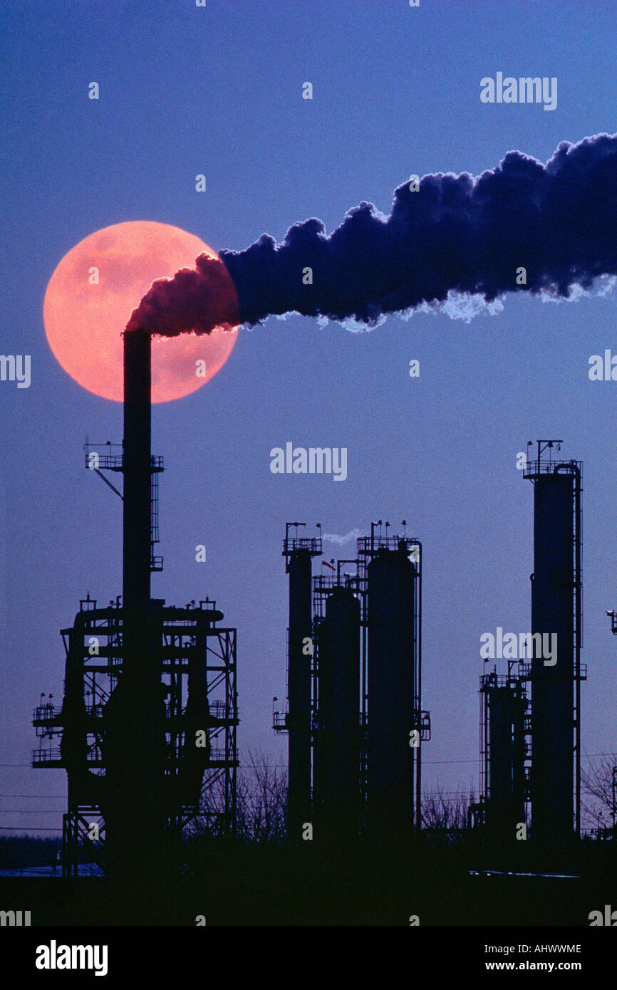 Smoke emerging from smokestack at chemical plant evening Stock Photo ...