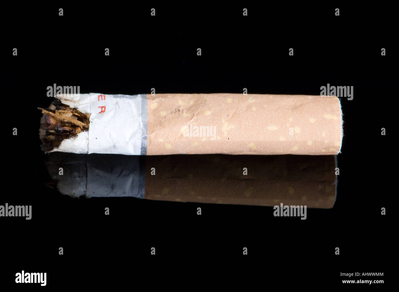 cigarette butt filter close up on black background 4 of 5 Stock Photo ...