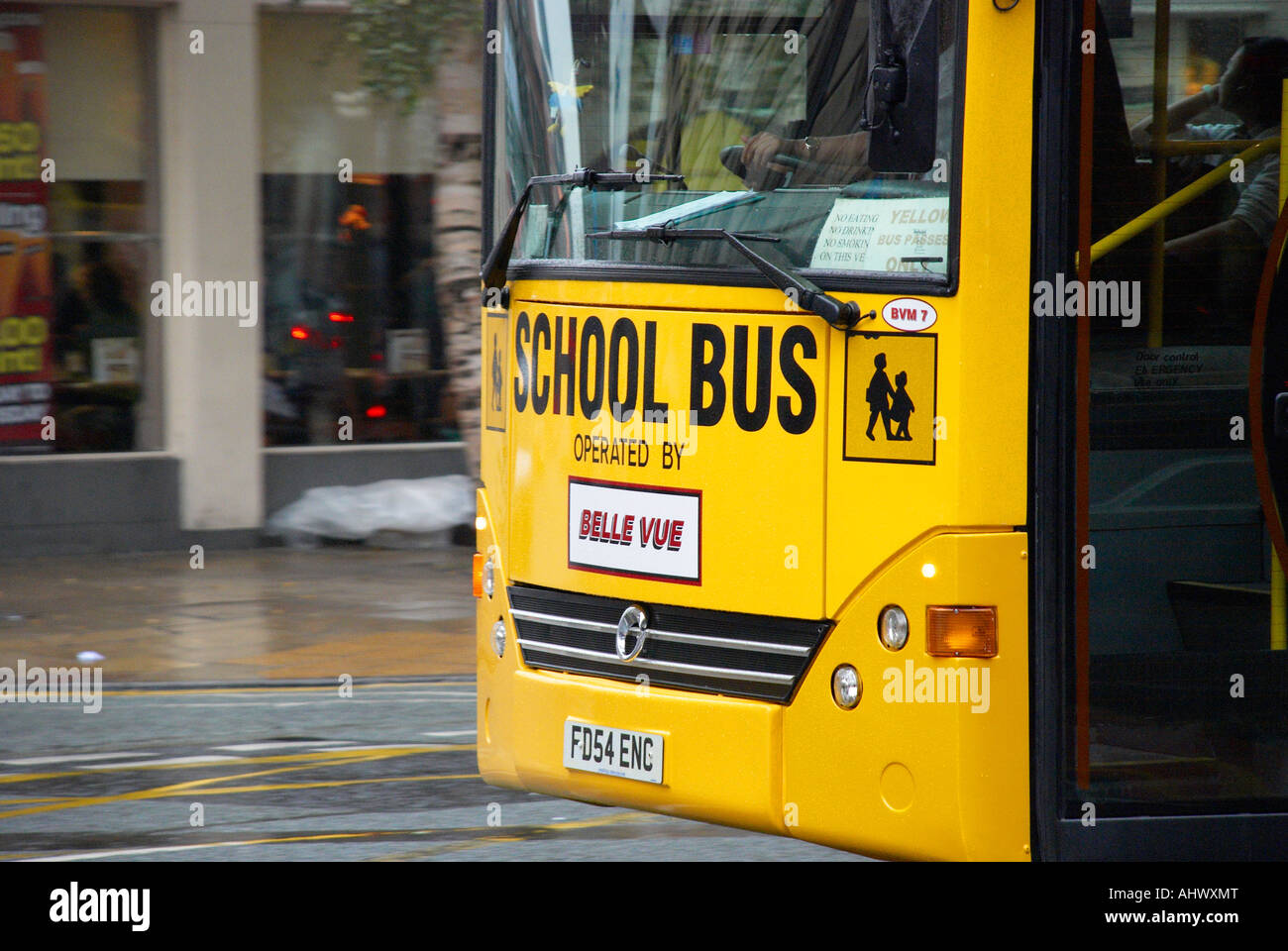 yellow school bus in manchester england Stock Photo - Alamy
