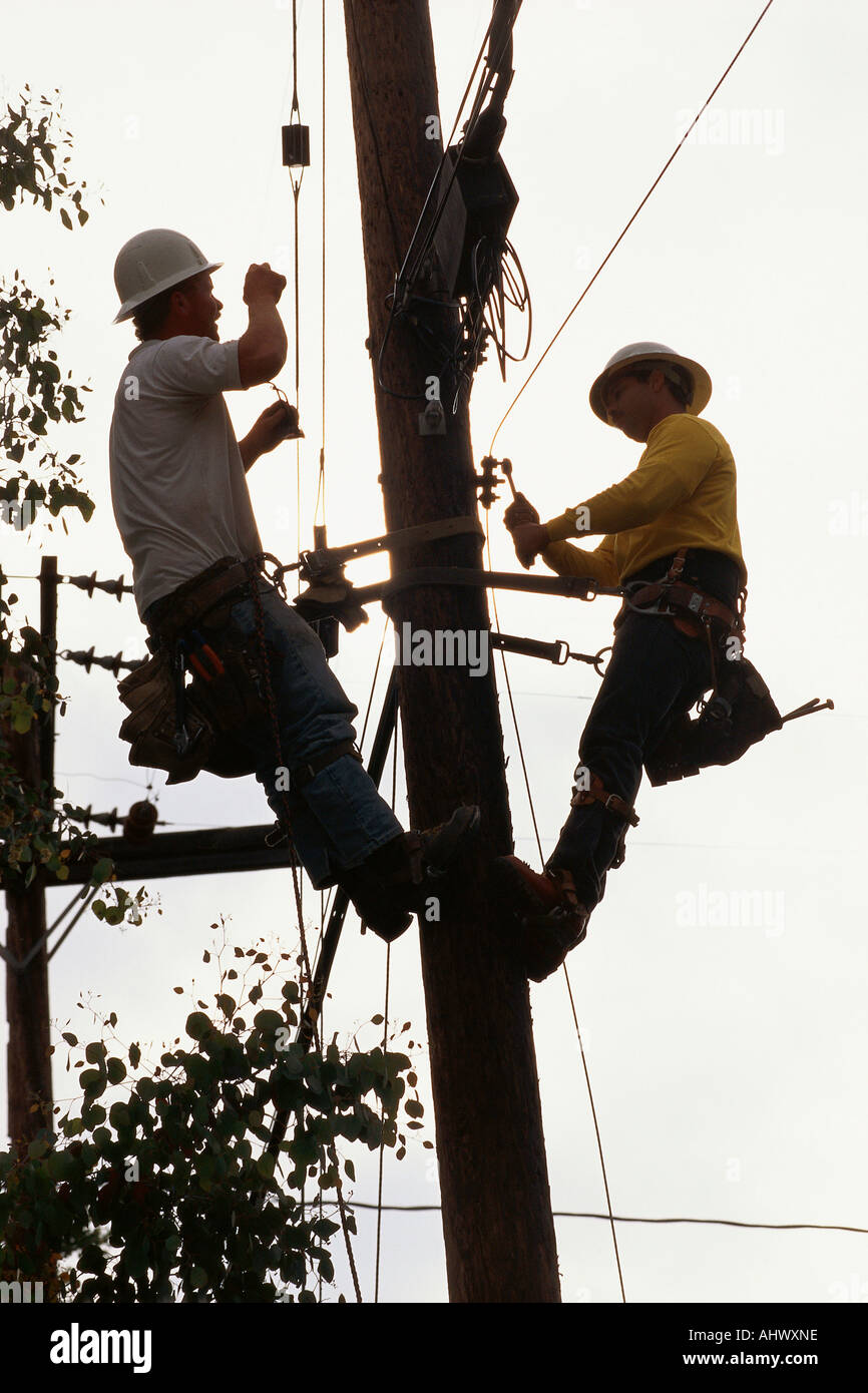 Lineman on utility pole hi-res stock photography and images - Alamy