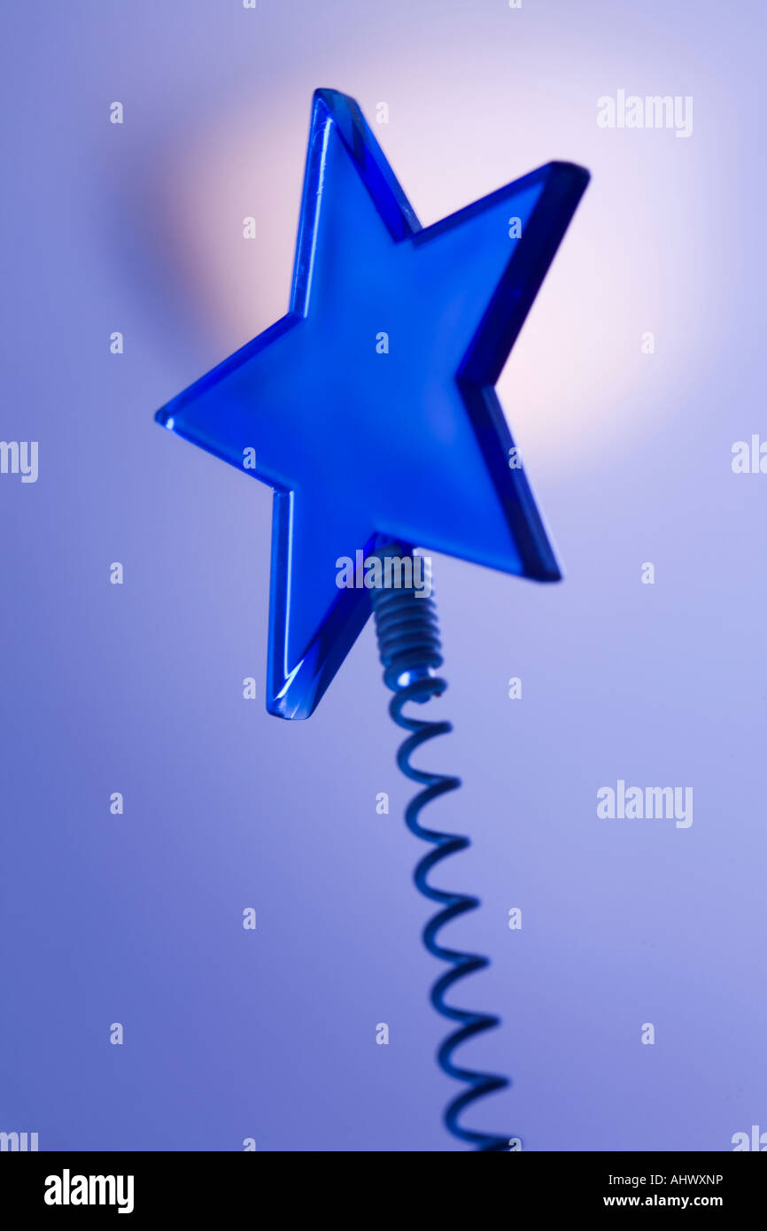 Christmas blue lucky star Stock Photo - Alamy