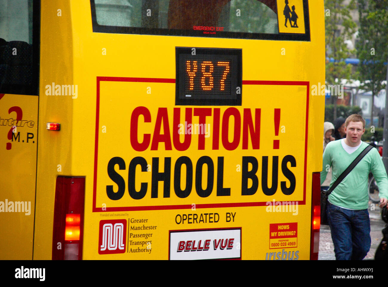 yellow school bus in manchester england Stock Photo - Alamy