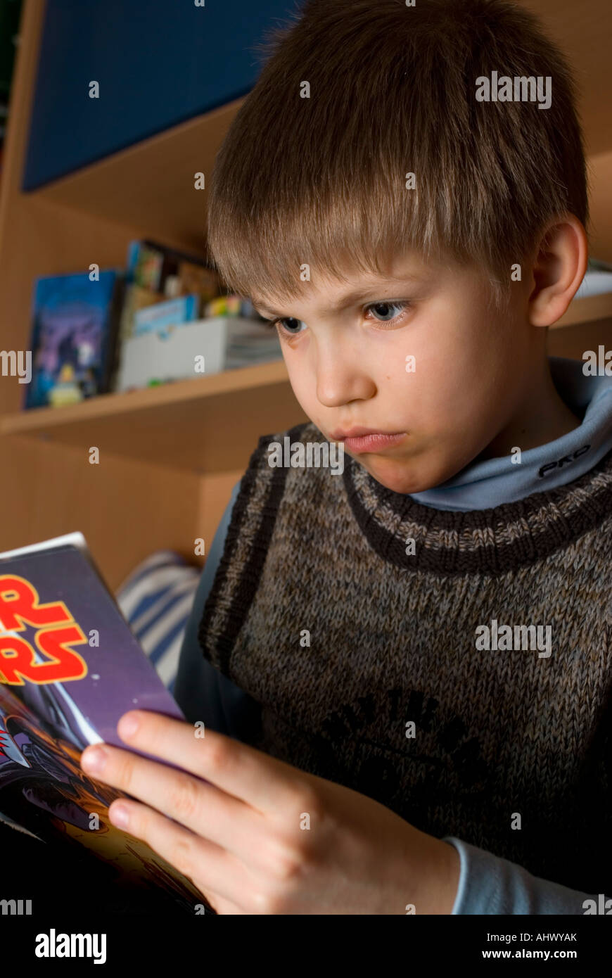 Child being read to hi-res stock photography and images - Alamy