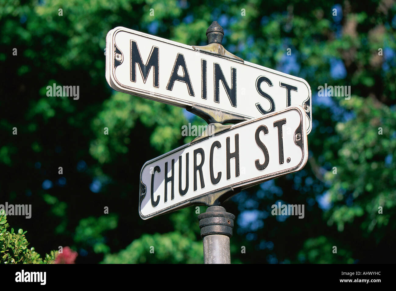 Sign post at corner of Main St and Church St Stock Photo - Alamy