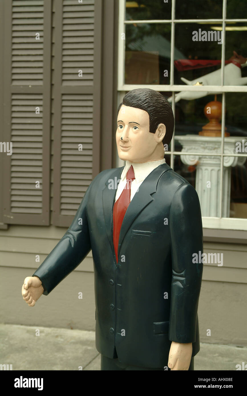 Dumby businessman holding hand out to shake hands Stock Photo - Alamy