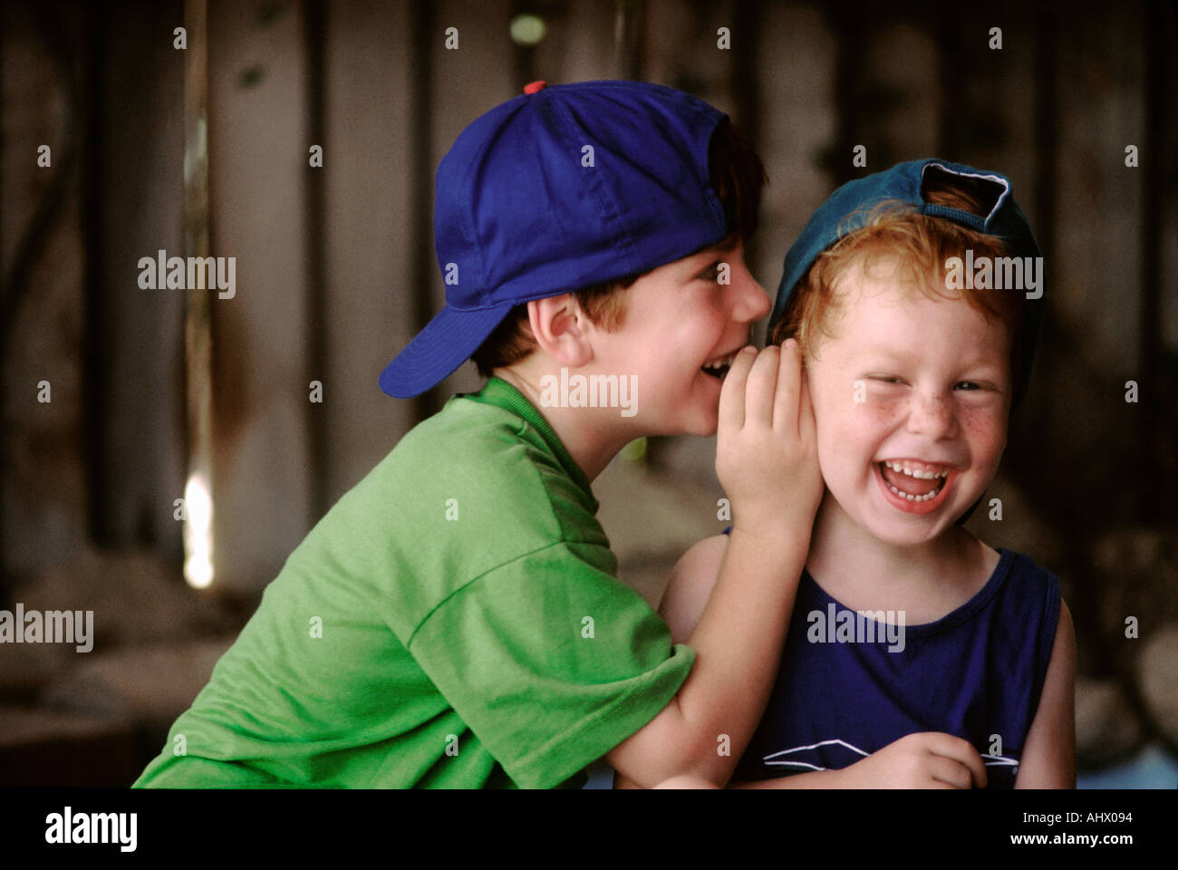 Boy laughing at another boy hi-res stock photography and images - Alamy