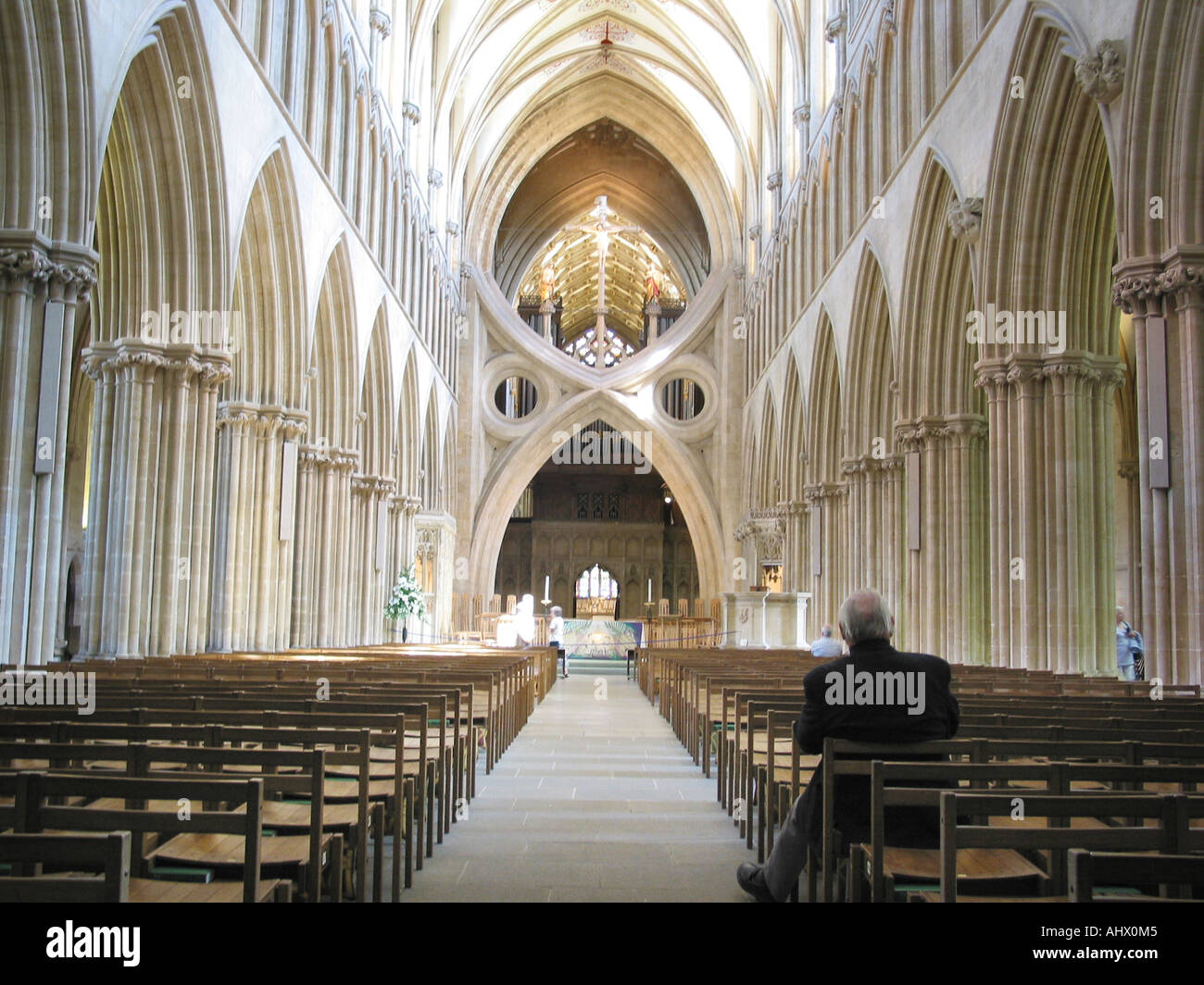 Interior of Wells Cathedral with one single visitor Somerset England ...
