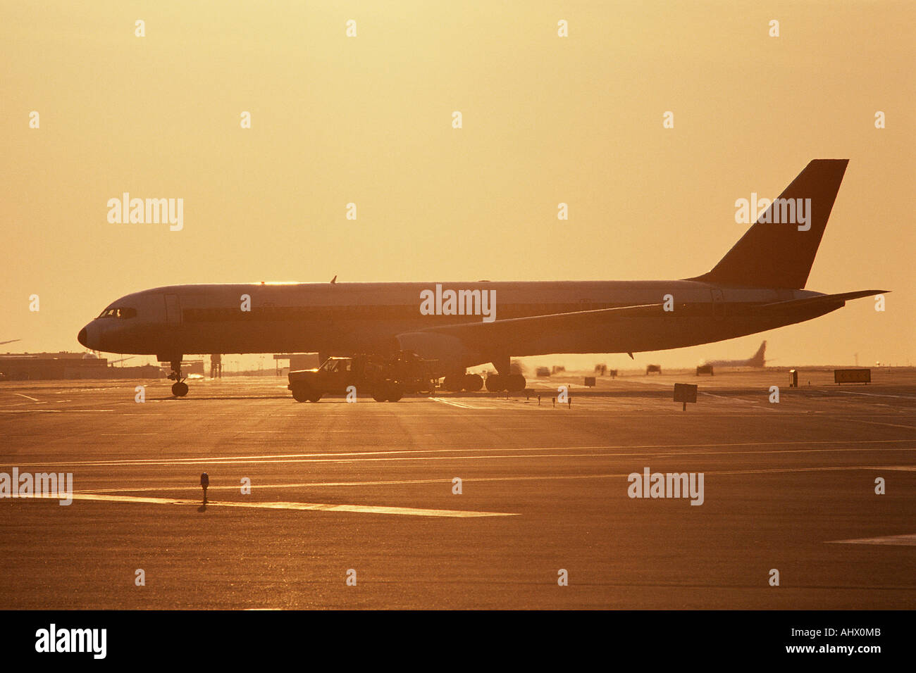 Jet airplane on tarmac Stock Photo - Alamy
