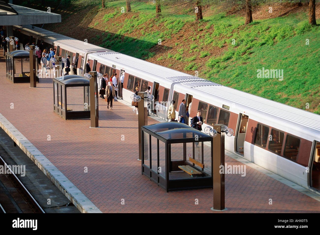 Commuter on train platform hi-res stock photography and images - Alamy