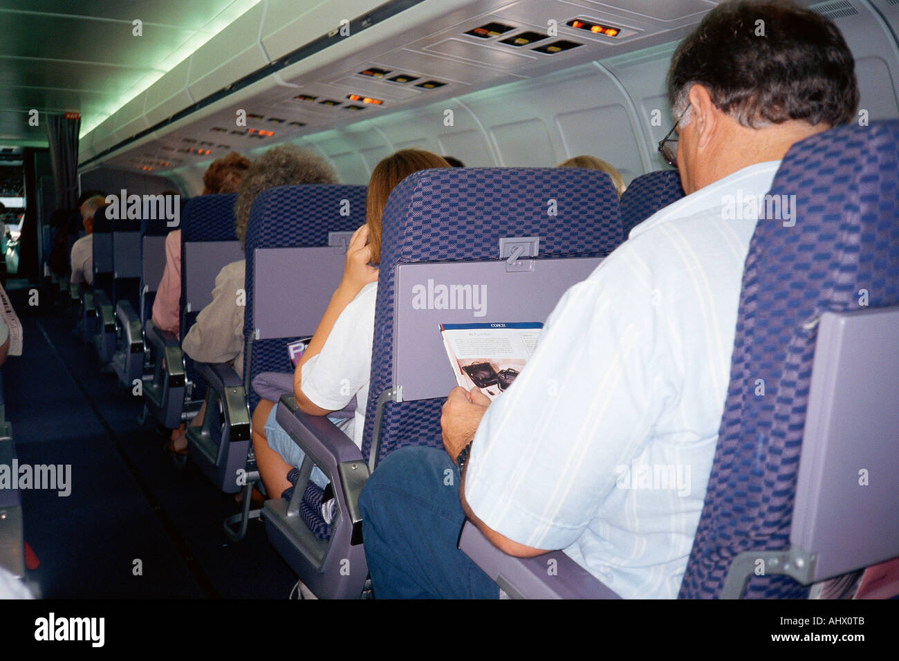 Interior of passenger jet airliner Stock Photo - Alamy