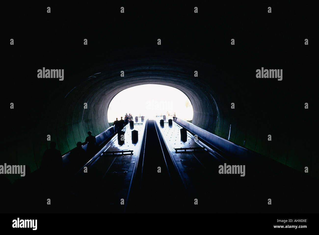 Moving walkway inside tunnel Stock Photo - Alamy