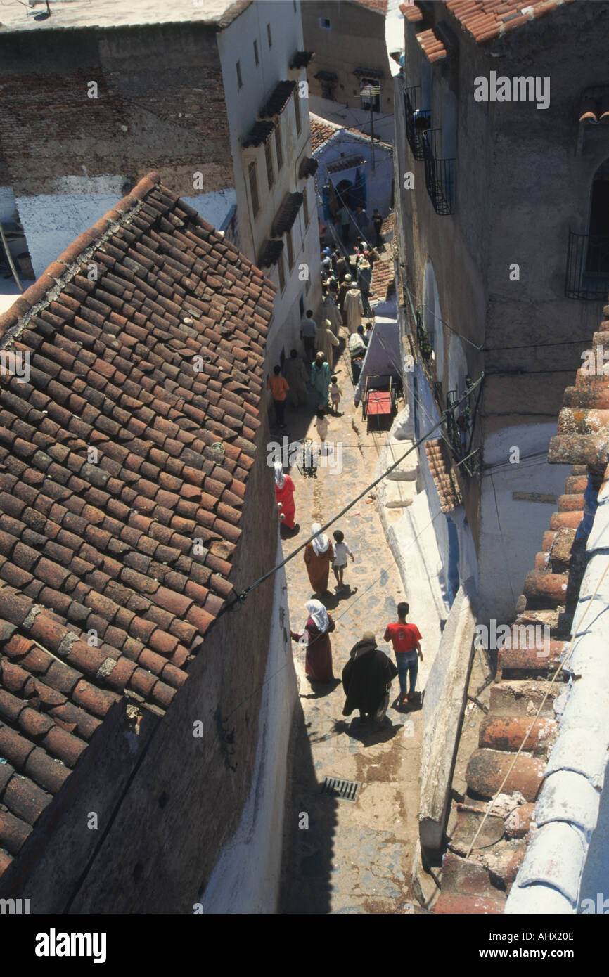 Birds eye view of funeral procession, through narrow streets of ...