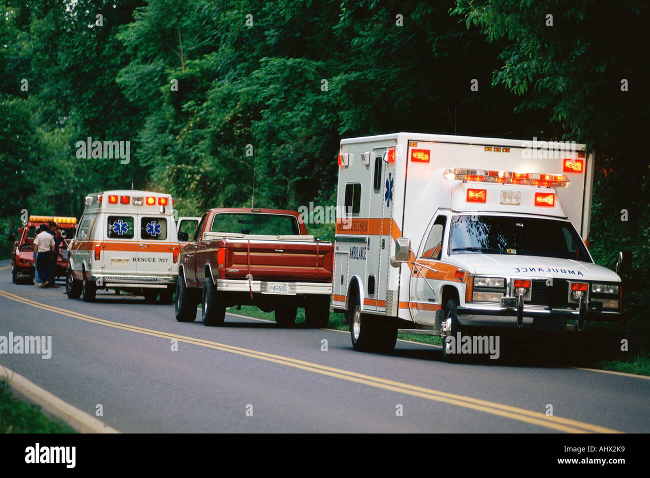 Ambulances parked on side of road Stock Photo - Alamy