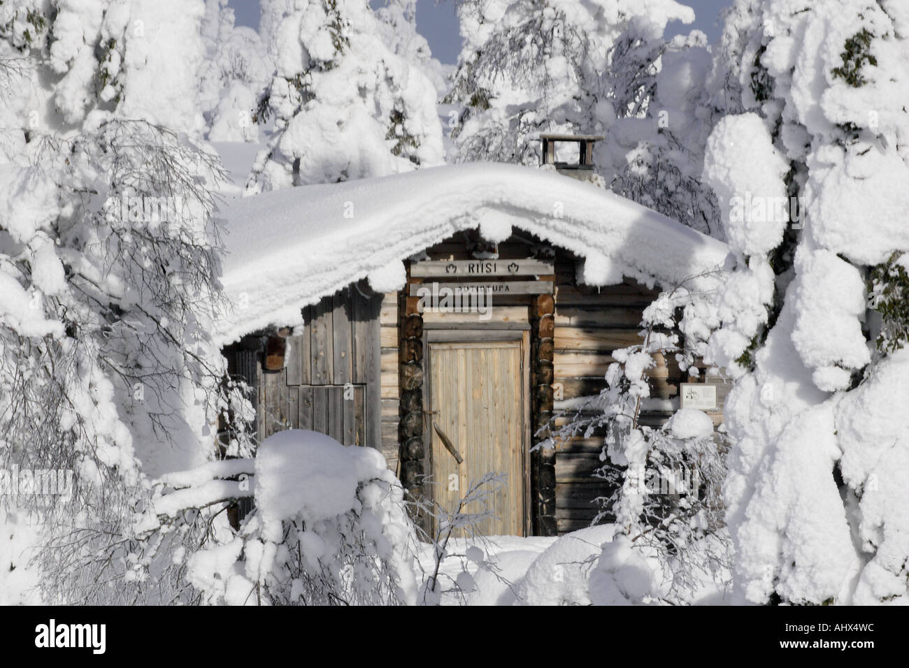 Winter scene in Finland showing a snow covered survival hut Stock Photo ...