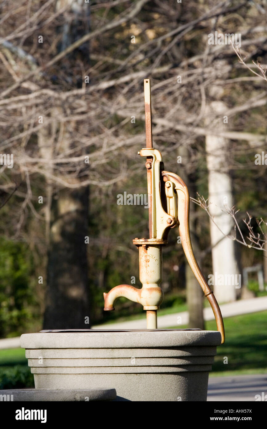 Old fashioned mechanical water pump Stock Photo - Alamy