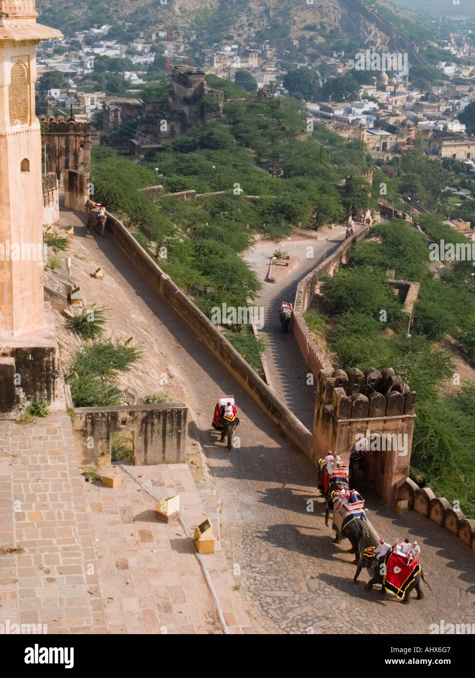 View to road to Amber Fort with Indian elephants carrying tourists ...