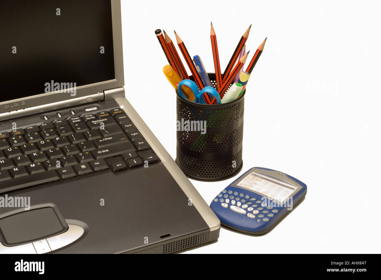 Office Workstation with pens, pencils, computer laptop cut out Stock ...