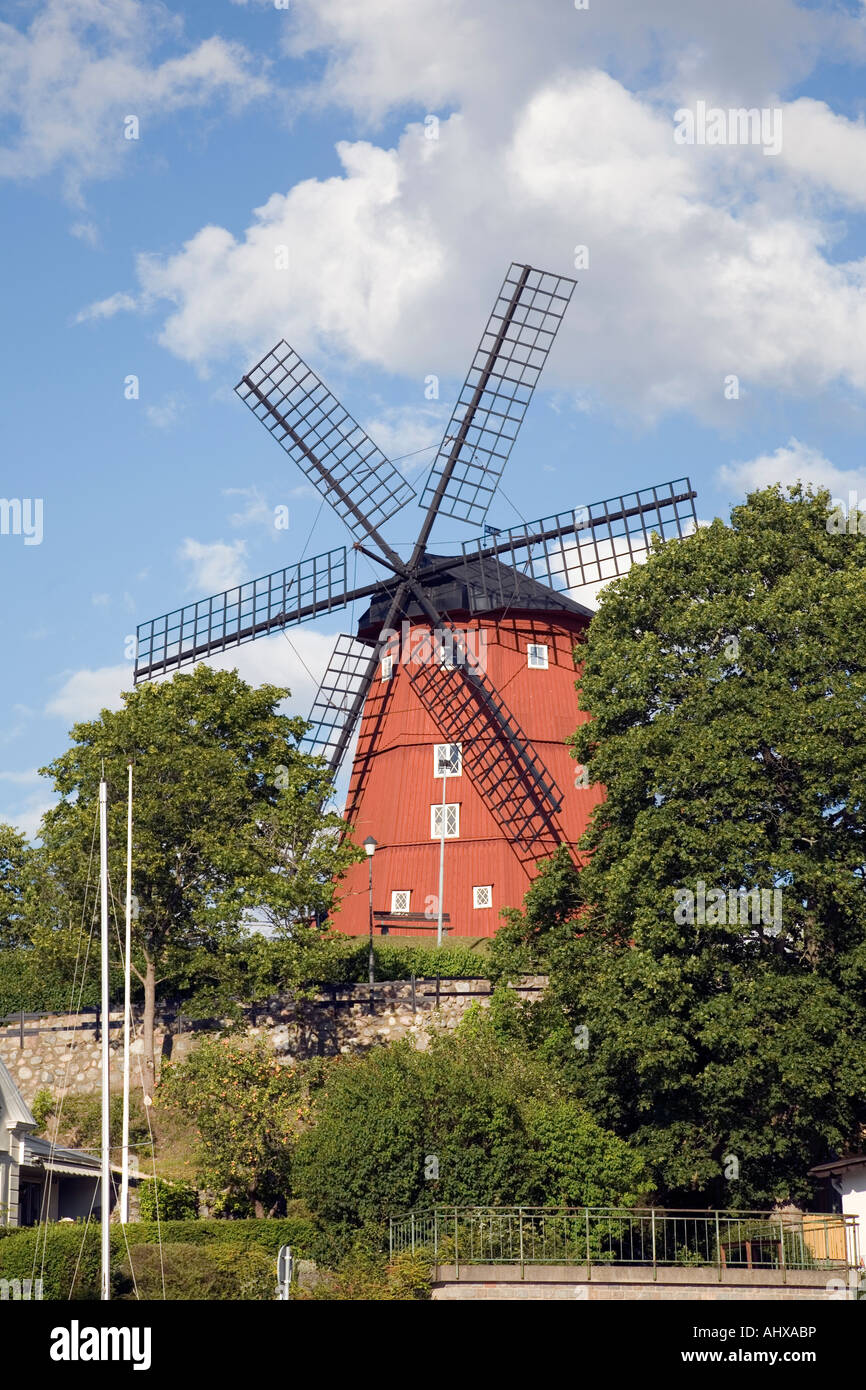 Windmill by harbour in Sweden Stock Photo - Alamy