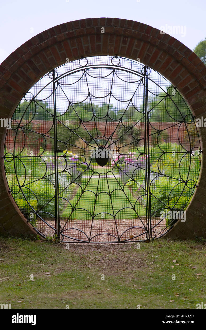 Wrought Iron Gate with Spider Web Design Stock Photo - Alamy
