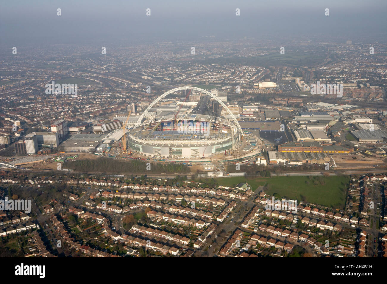 High level oblique aerial view north of Wembley Stadium building ...