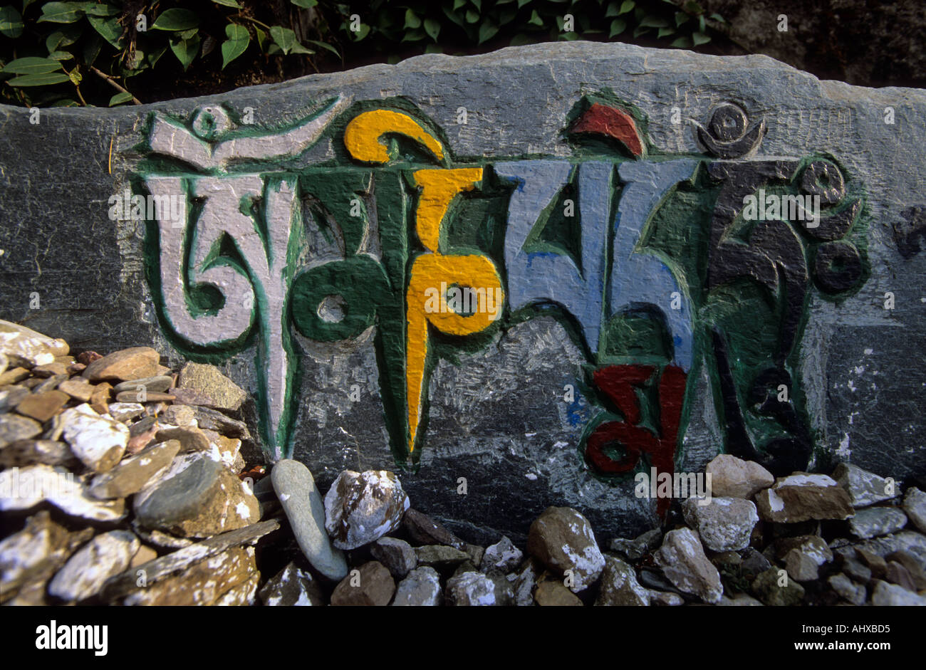 OM MANI PEME HUNG mantra on mani stones in Kora route aroung Dalai Lama ...