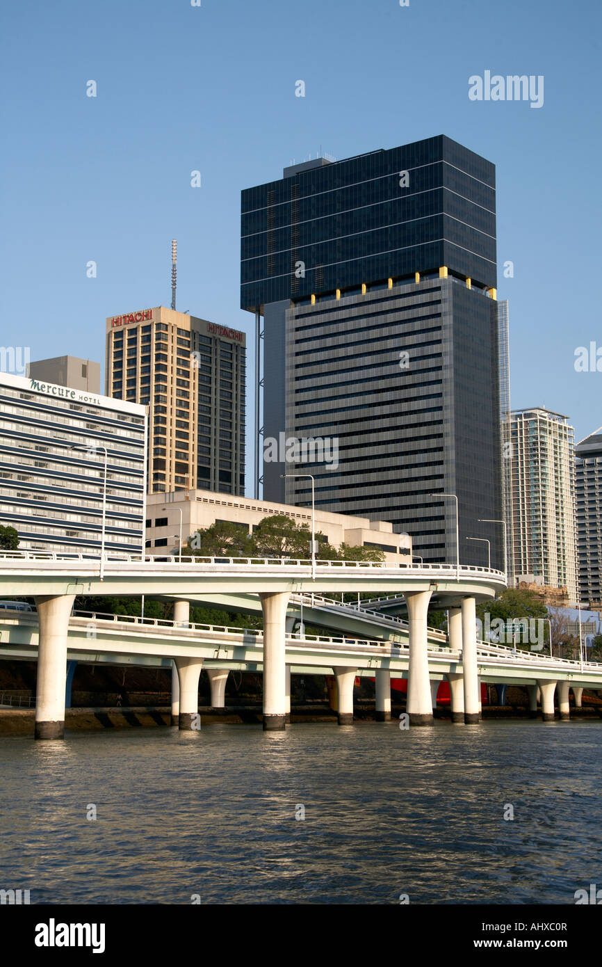CBD buildings in evening summer sunlight from Brisbane river Queensland ...