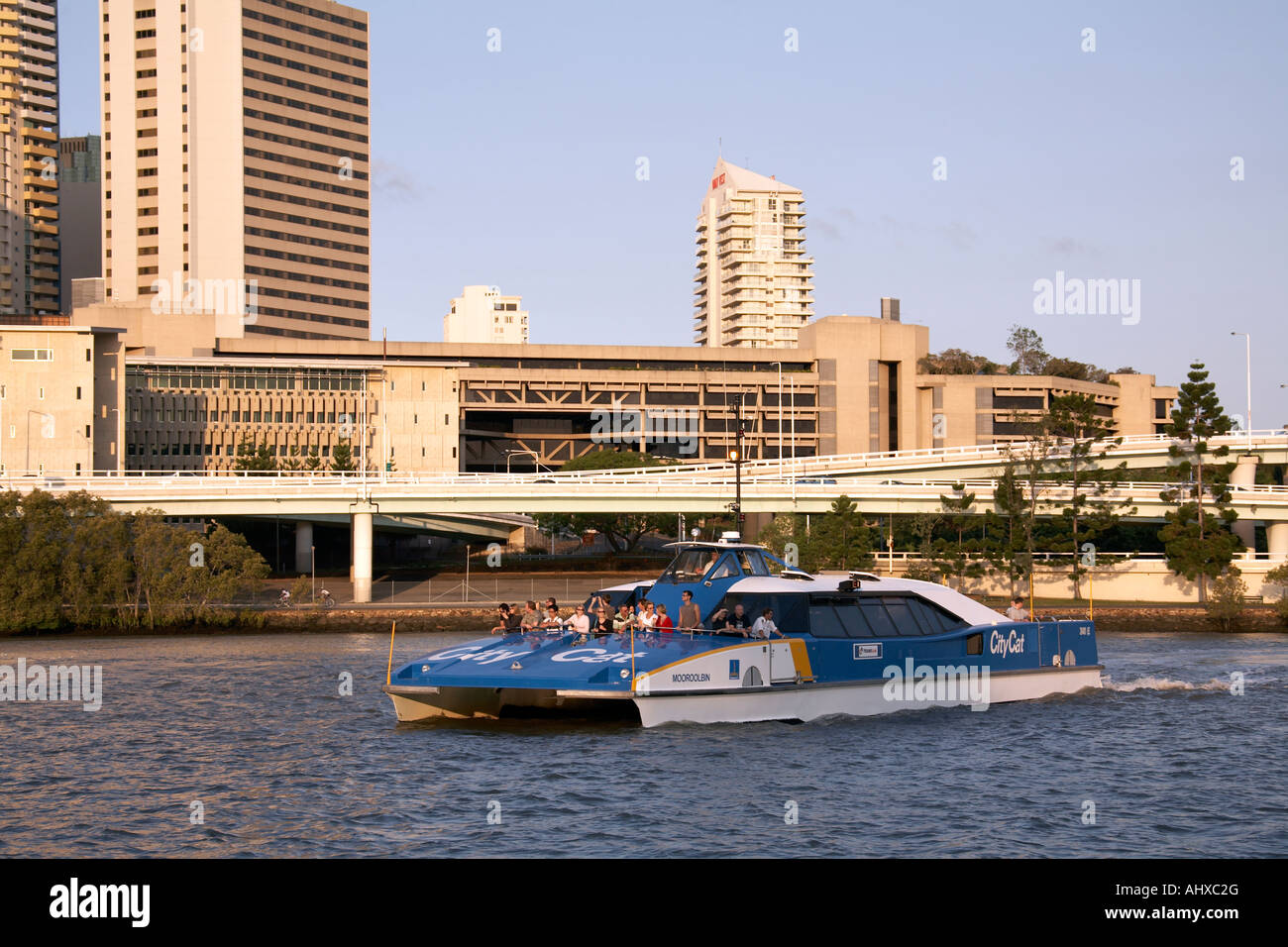 Central Business District buildings with City Cat ferry in evening ...