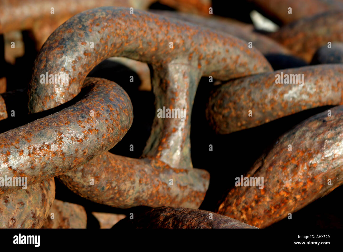 close up of the links in a length of large heavy duty industrial anchor ...