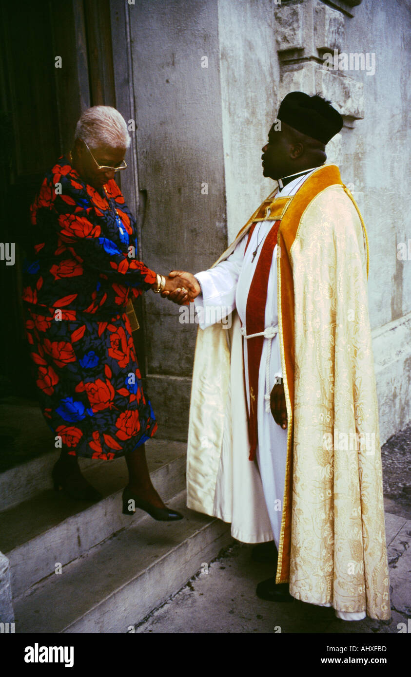 Priest greeting parishioners hi-res stock photography and images - Alamy