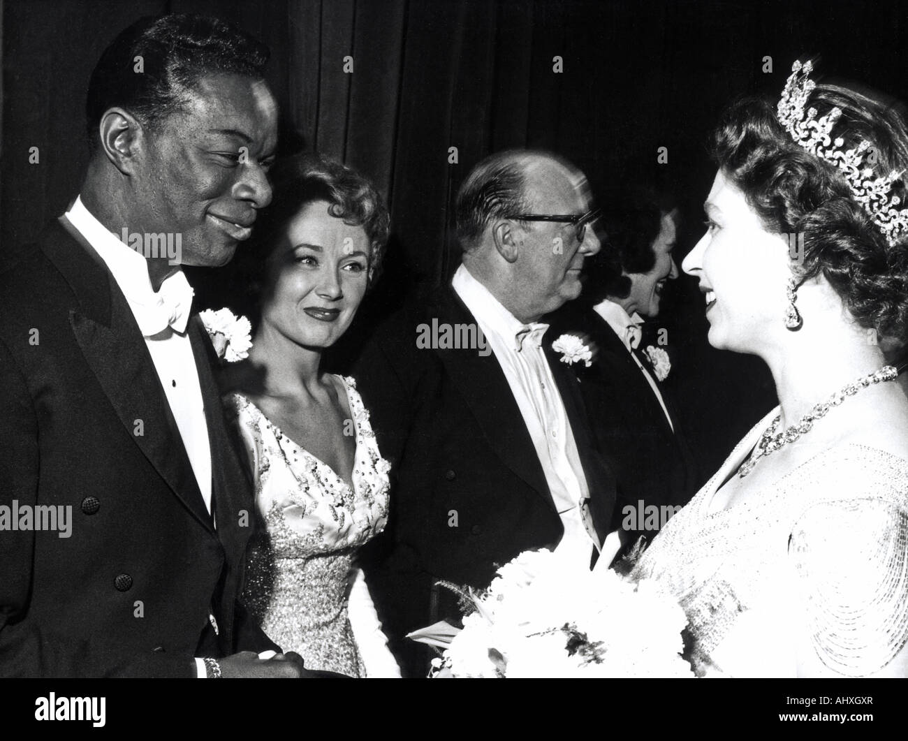 NAT KING COLE is presented to Queen Elizabeth II at the Royal Variety ...
