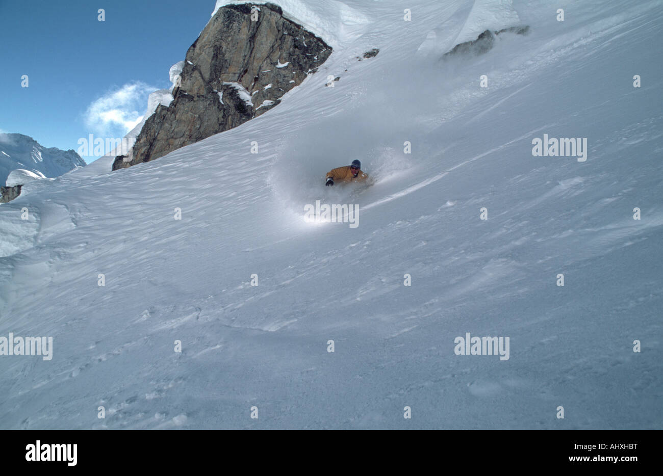 Snowboarder in steep slope hi-res stock photography and images - Alamy