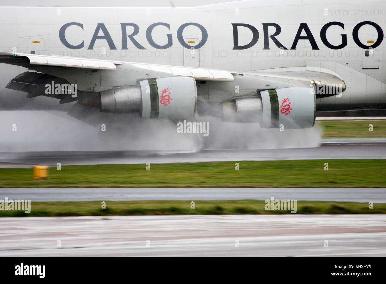 Commercial civil aviation cargo plane in poor rainy weather Stock Photo ...