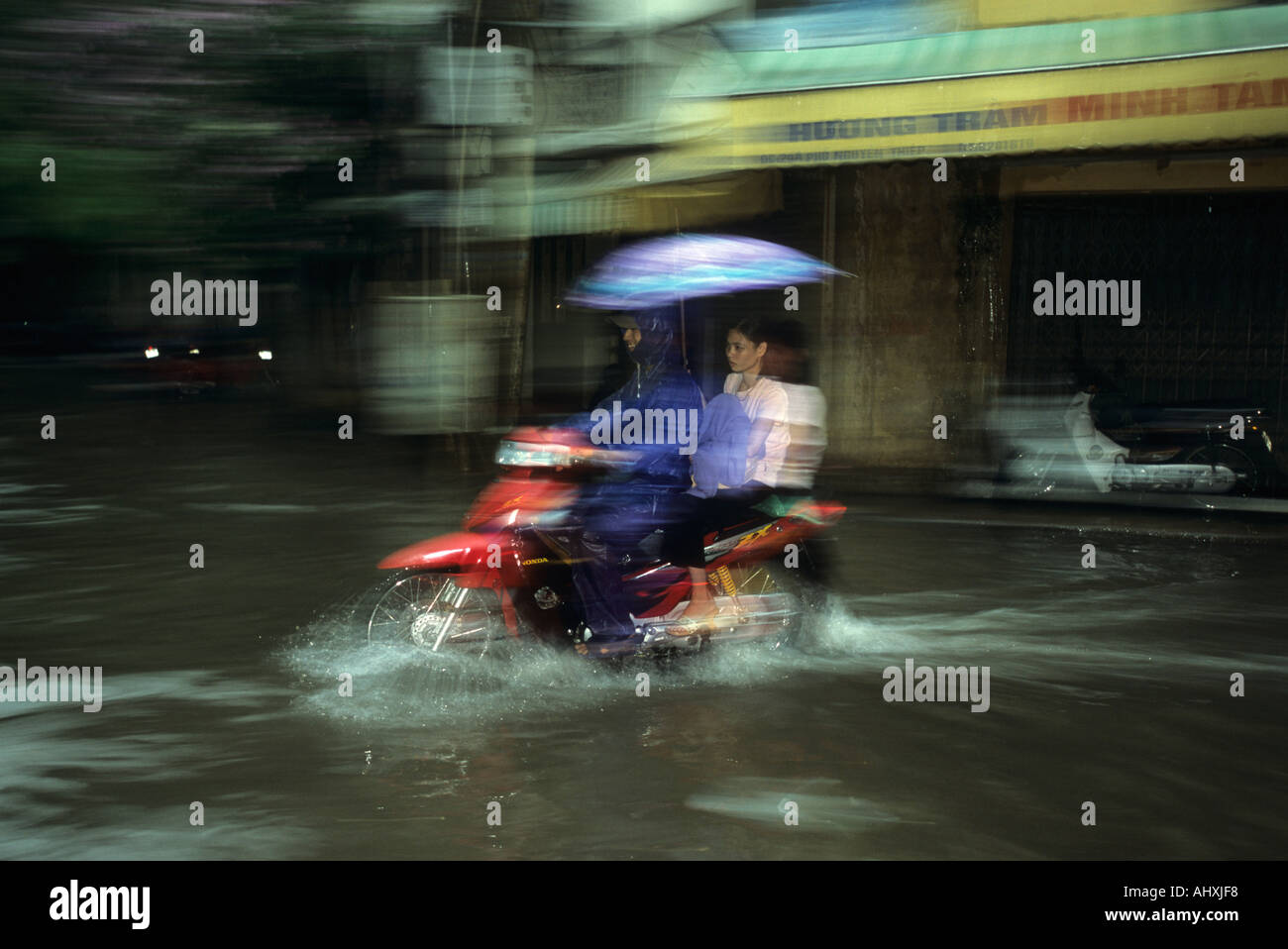 Vietnam Hanoi streets flooded after heavy rain June 2005 Stock Photo ...