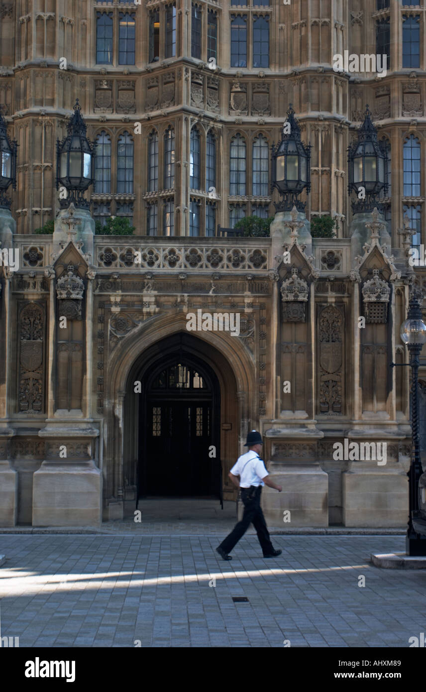 Policeman walking hi-res stock photography and images - Alamy
