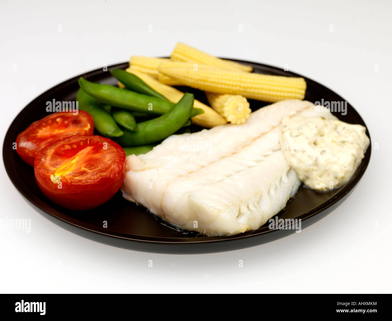 Grilled Cod and Vegetables Stock Photo - Alamy