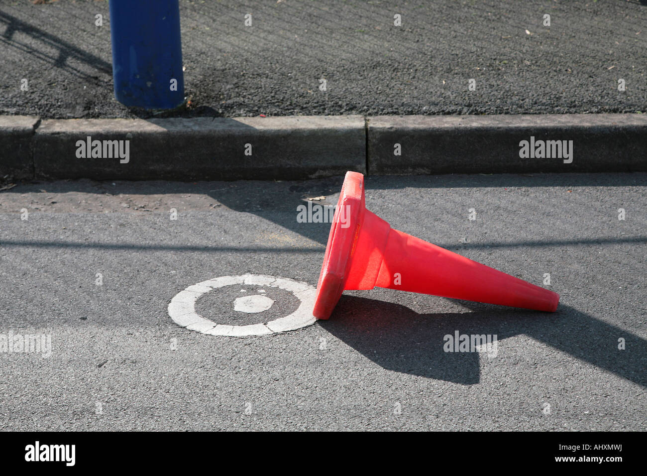 Fallen traffic cone Stock Photo - Alamy
