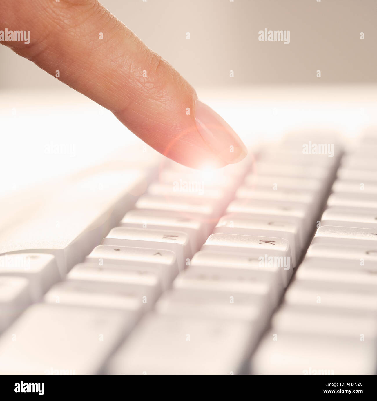 Finger and computer keyboard Stock Photo - Alamy