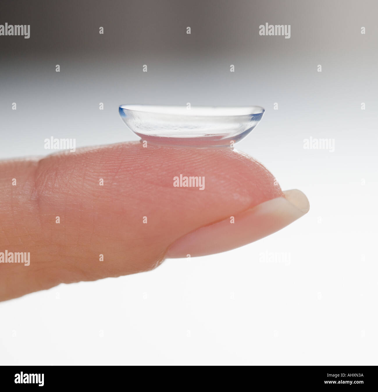 Closeup of finger with contact lens Stock Photo - Alamy