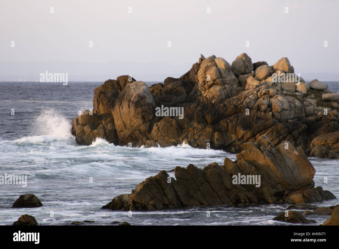 Waves crashing onto rocks and surf Stock Photo - Alamy