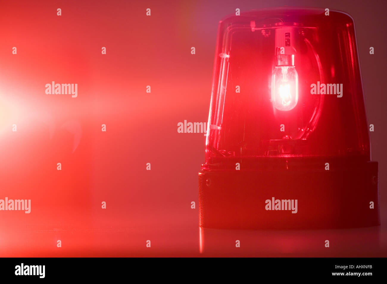 A glowing red emergency light Stock Photo - Alamy